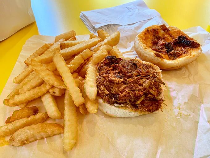 Sometimes the simplest pleasures are the best—golden fries alongside barbecue sandwiches that make you question why you ever ate anything else.