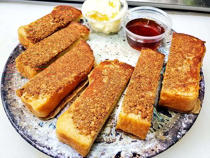 French toast sticks that make you wonder why we ever bothered with plates and forks when dippable breakfast joy was an option all along.