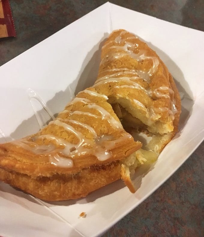 This fried apple pie isn't just dessert; it's edible nostalgia with a crispy exterior that shatters like your diet resolutions.