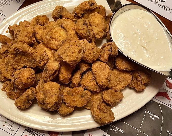 These aren't just fried mushrooms—they're little golden nuggets of umami that disappear from the plate with suspicious speed.