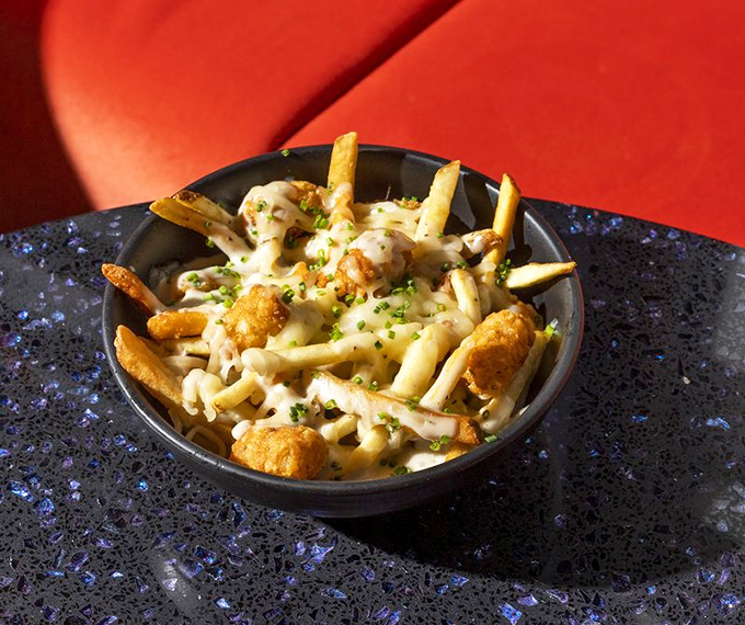 These loaded fries aren't just a side—they're the main event. Golden, crispy, and more addictive than your favorite streaming series.