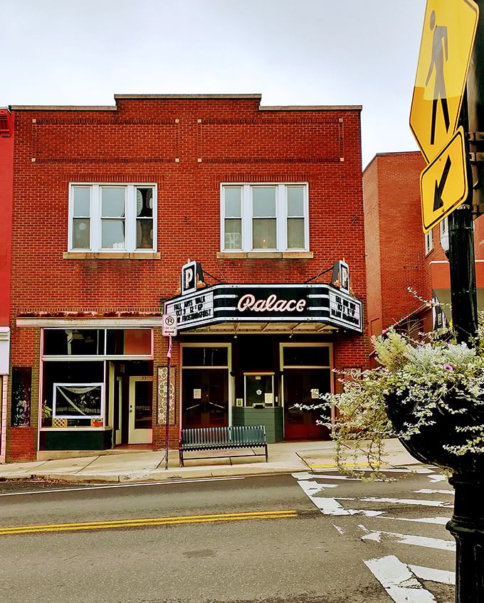 The Palace Theatre's classic marquee beckons like entertainment from an era when movies cost less than coffee drinks.