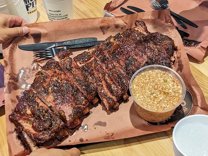 These ribs don't just fall off the bone—they leap joyfully onto your fork in a spectacular display of barbecue perfection.