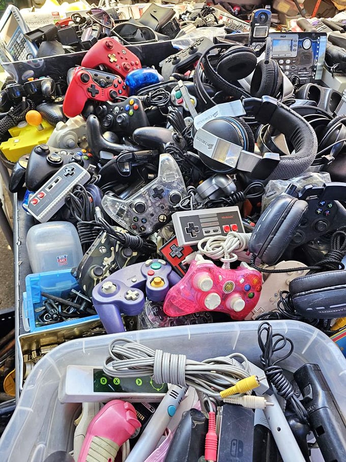 Gaming nostalgia meets modern tech in a beautiful chaos of controllers and memories.