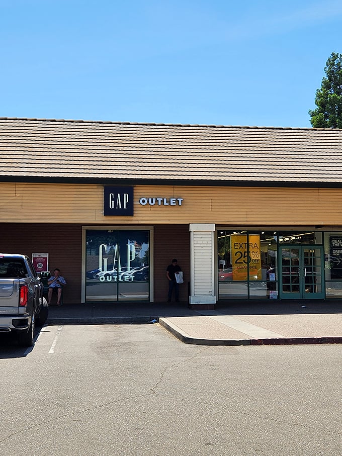 GAP Outlet's bright yellow "Extra 25% Off" sign works like retail dopamine – triggering that special thrill only unexpected discounts can provide.