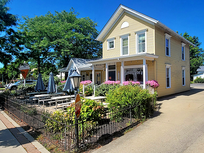 This sunny yellow Victorian isn't just a building—it's the kind of place that makes you contemplate a career change to innkeeper.