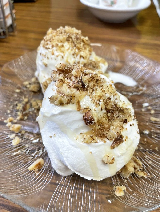 Greek yogurt elevated to art form. Those honey-drizzled walnuts aren't just toppings—they're the crown jewels of breakfast nobility.