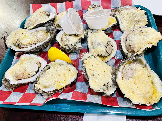 These aren't just grilled oysters—they're little boats of cheese-laden bliss sailing straight into your heart (and arteries).
