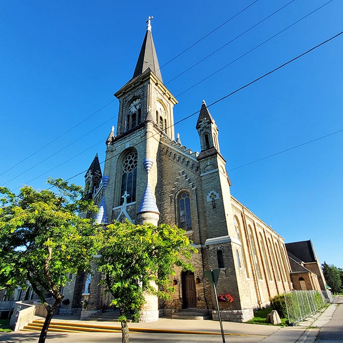Guardian Angel Catholic Church reaches skyward with its impressive spires, a brick-and-mortar testament to the faith of early settlers.