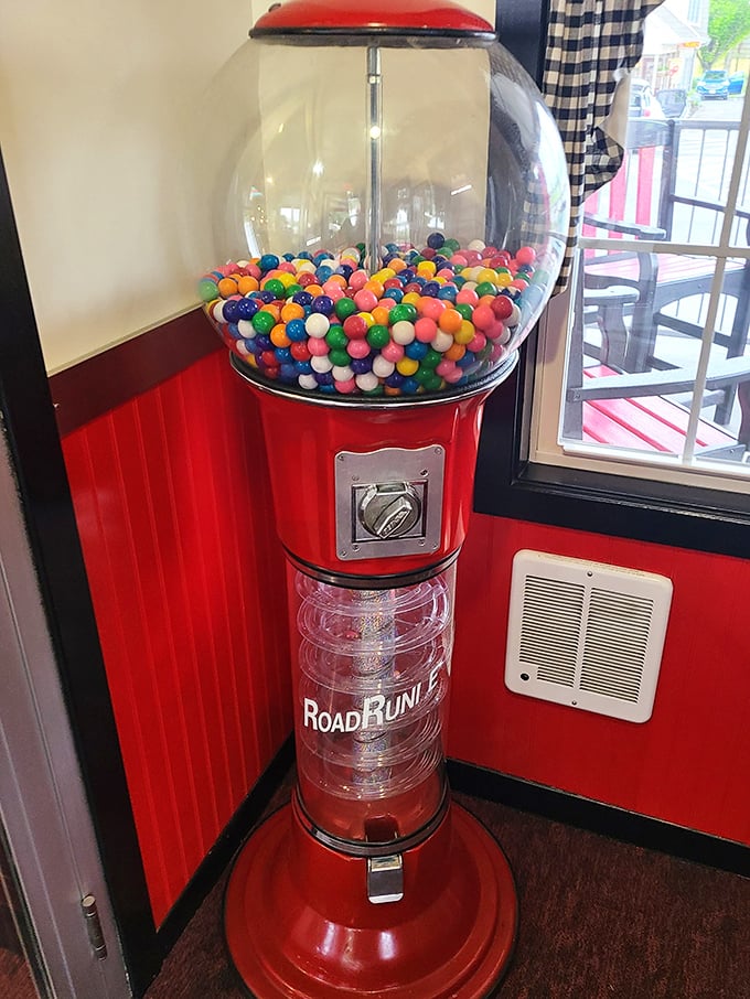 Every authentic 50's diner needs a gumball machine, and this Road Runner beauty stands sentinel by the door, promising colorful rewards for a quarter.
