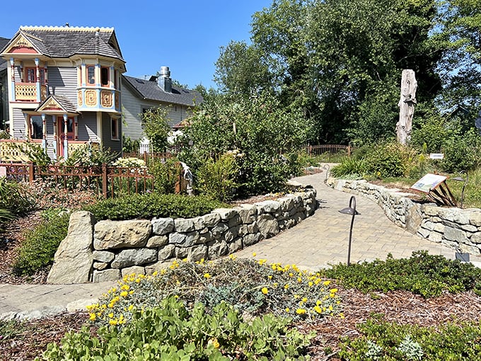 Garden pathways wind through stone walls and native plantings, creating pocket-sized sanctuaries that feel miles away from everyday concerns.