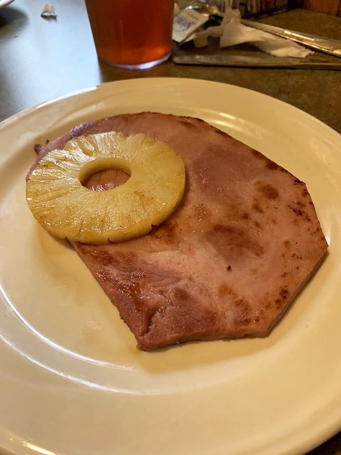 Ham steak and pineapple—the original sweet and savory power couple. Before bacon met maple, this dynamic duo was stealing hearts across diner counters everywhere.