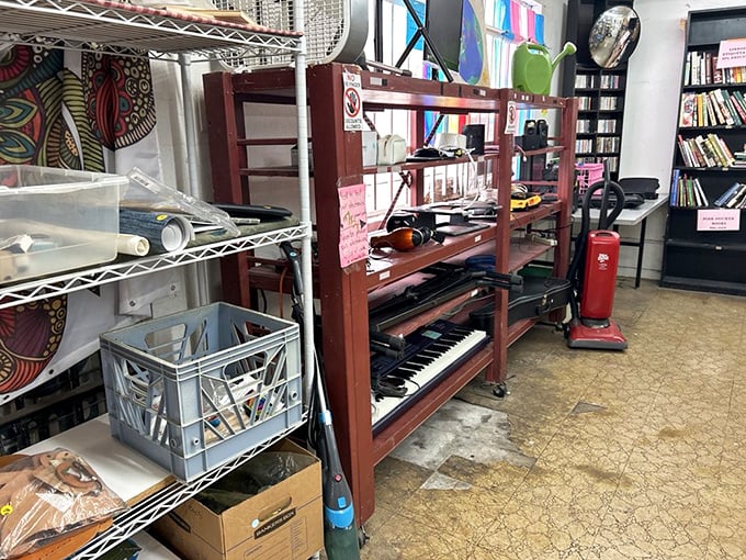 Musical instruments, vacuum cleaners, and mysterious gadgets coexist in beautiful chaos—like a garage sale curated by Salvador Dalí.
