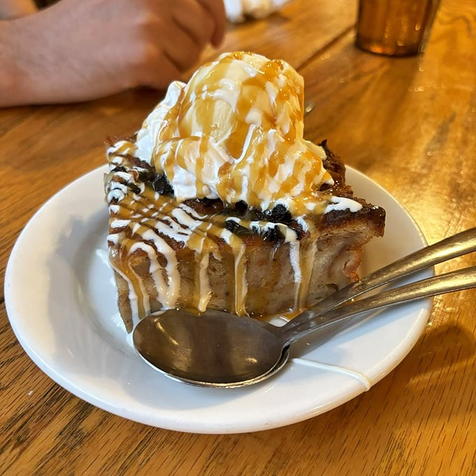 Bread pudding that doesn't just satisfy your sweet tooth—it throws a party for it, complete with ice cream and caramel drizzle.