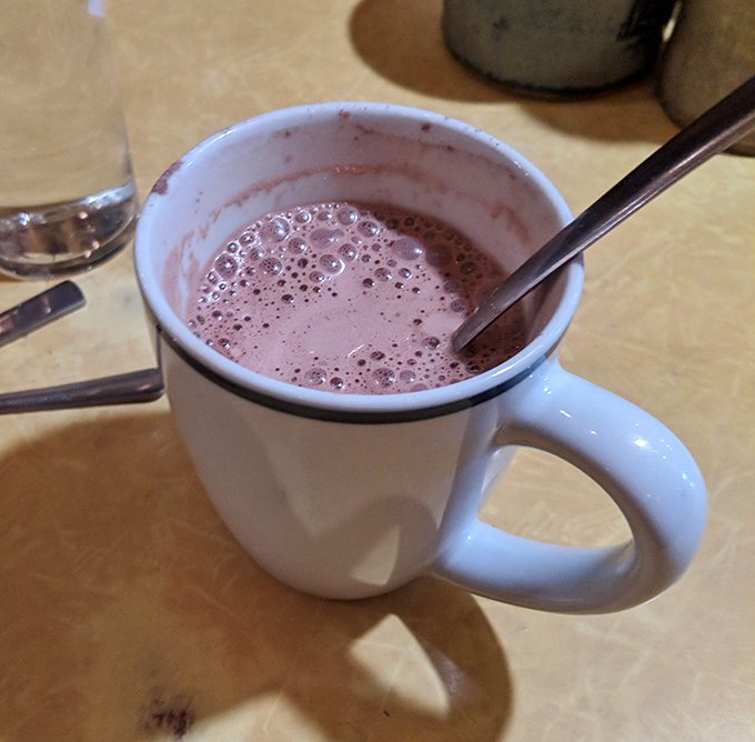 Hot chocolate so rich it makes Swiss bankers jealous. In Minnesota winters, this mug is worth more than cryptocurrency.