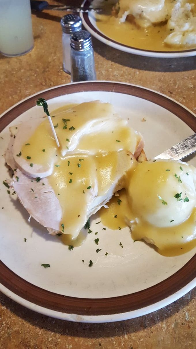 Eggs Benedict done right—a harmony of ham, hollandaise, and perfectly poached eggs. Brunch diplomacy at its finest, bringing runny yolks and Canadian bacon together in peace.