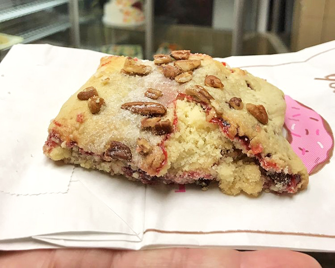 This berry-studded scone with perfectly placed pecans isn't just breakfast—it's edible architecture that happens to pair perfectly with coffee.