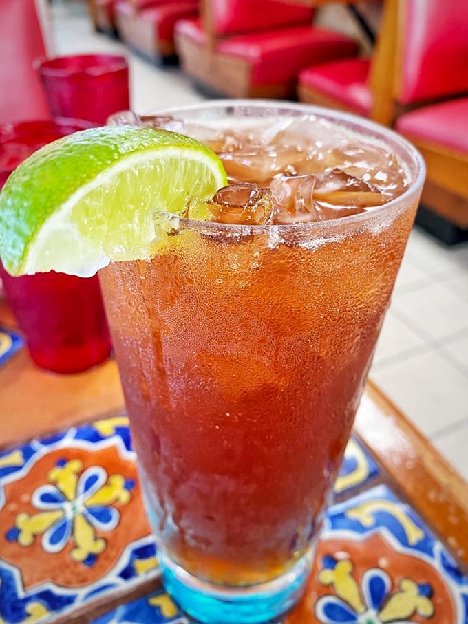 An iced tea so refreshing it makes Miami's humidity feel like a distant memory, especially with that perfect lime wedge perched on the rim.