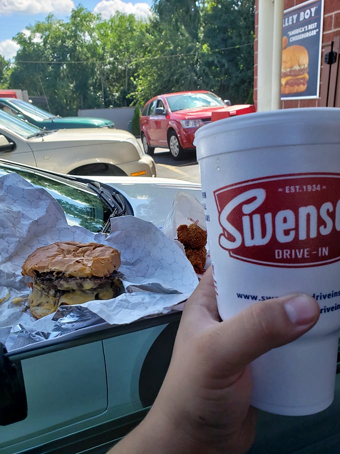Car dining elevated to an art form—where your cupholder becomes a table setting and your steering wheel a dining companion.