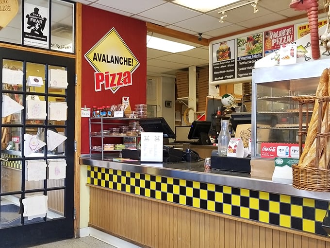 The yellow and black checkered counter feels like you've stepped into a friendly taxi that's about to take your taste buds on a joyride.