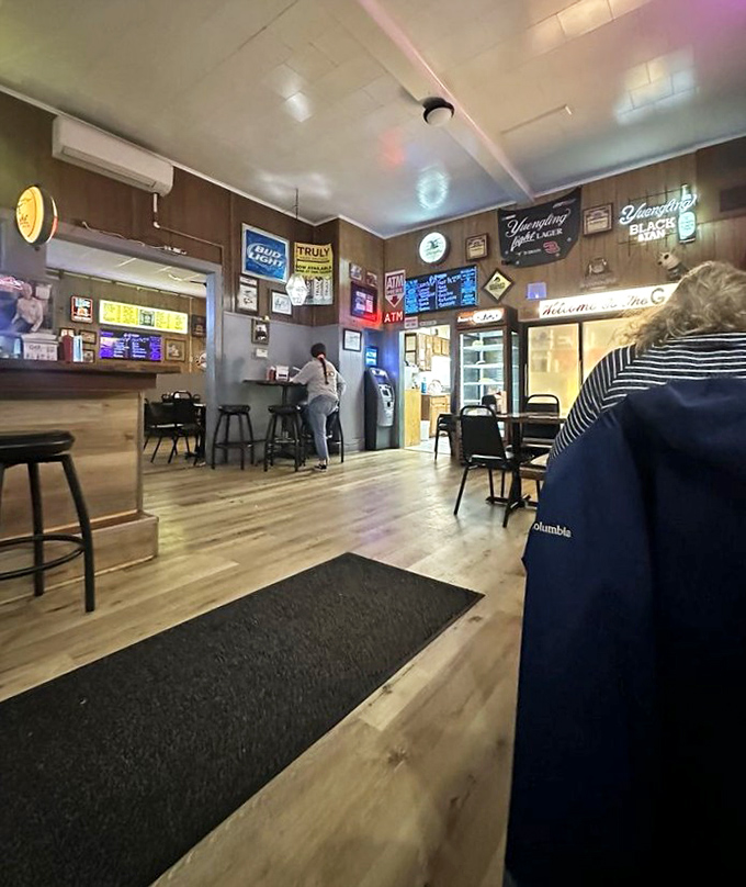 The tavern's interior is a master class in unpretentious comfort—where conversations flow as easily as the beer.