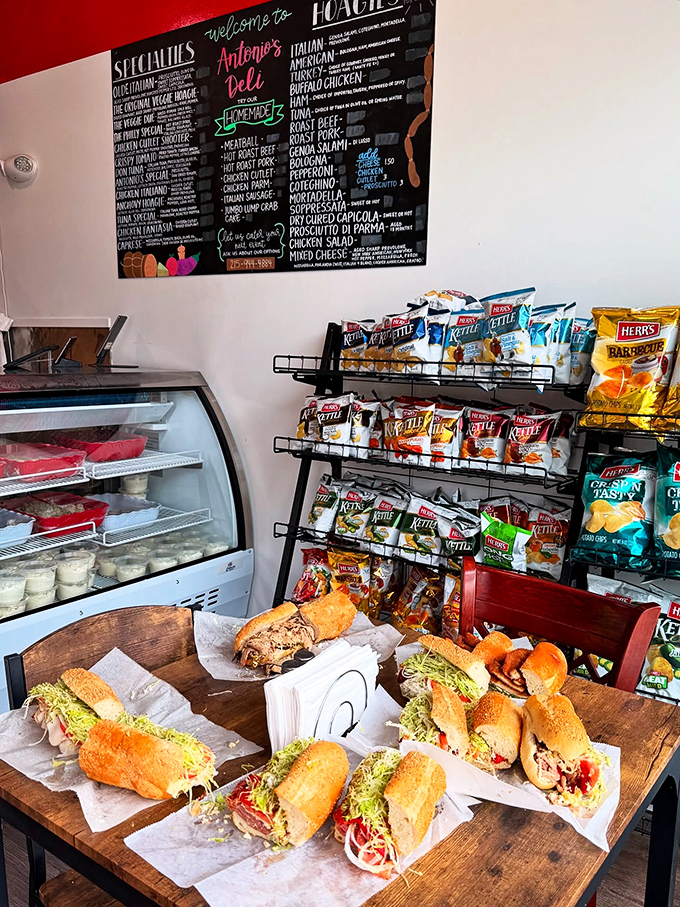 The sandwich workshop in all its glory—where chip selection is taken as seriously as the main event. A proper Philadelphia food pilgrimage.
