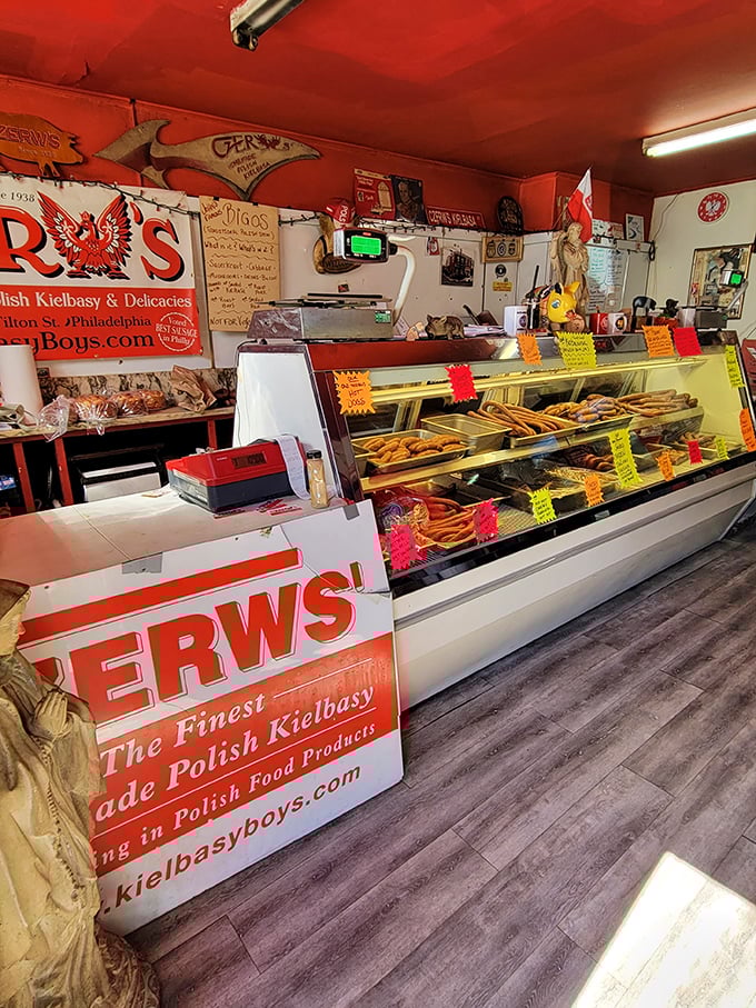 The red ceiling, the display case, the handwritten signs—this isn't retro design; it's a place that never saw a reason to change.