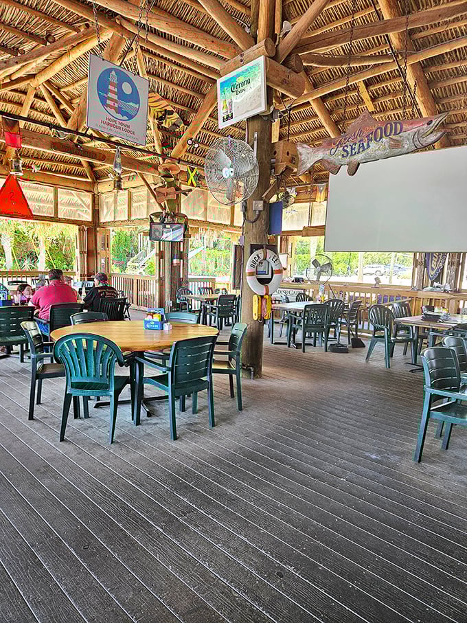 Nautical charm meets casual comfort. The open-air dining space invites you to linger longer than you planned—and you absolutely will.
