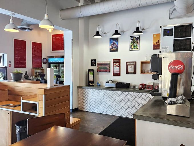 The counter service area combines modern subway tile with classic red signage—like if your grandmother's kitchen got a HGTV makeover.