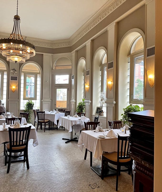 High ceilings, elegant chandeliers, and a dining room bathed in natural light—this isn't just a restaurant, it's a cathedral of carbs.