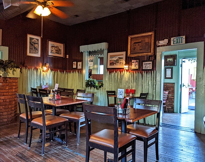 The mint-green wainscoting and wood-paneled walls aren't trendy design choices—they're authentic touches from an era when restaurants lasted generations.
