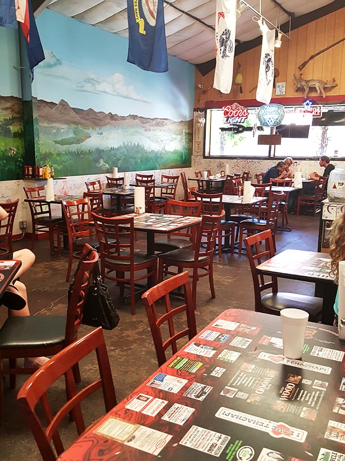 The dining room buzzes with conversation and anticipation, while that spectacular mural reminds you you're dining in California's mountain country.