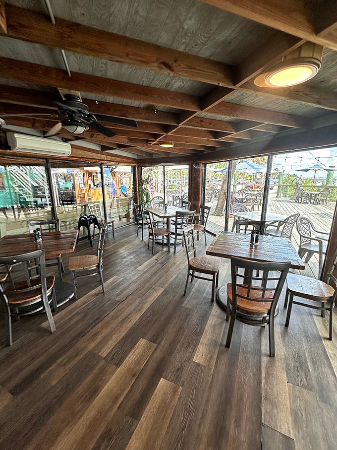 Rustic wooden beams and panoramic windows create the perfect backdrop for seafood feasting—just casual enough to make flip-flops appropriate attire.