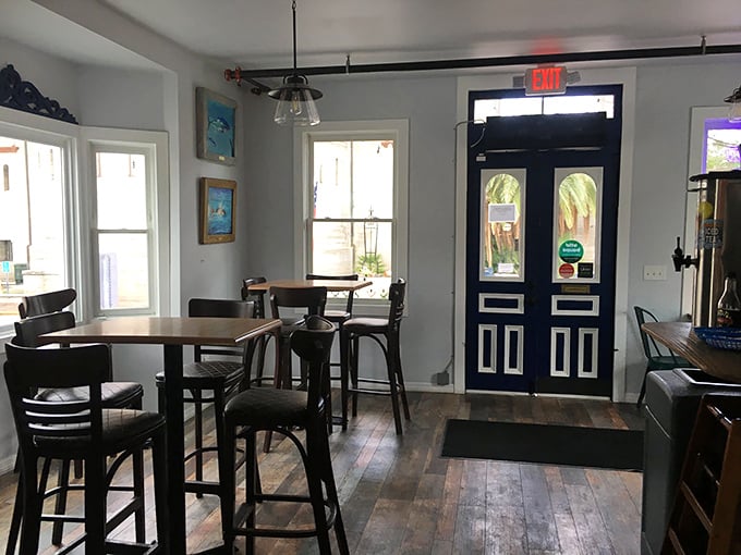 The interior feels like stepping into a time capsule where good food matters more than trendy decor. Those wooden chairs have supported generations of happy diners.