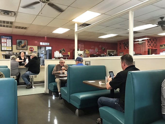 Classic diner booths in that perfect shade of turquoise—where strangers become regulars and regulars become family.