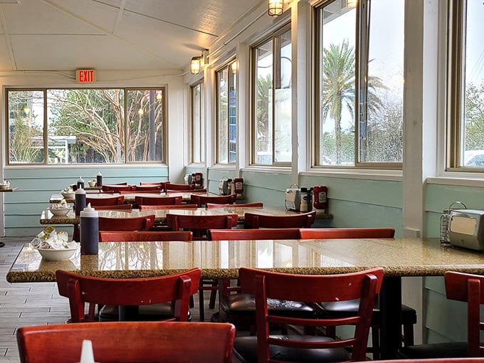 Sunlight streams through windows illuminating a dining room where memories are made between bites of perfect breakfast fare. 