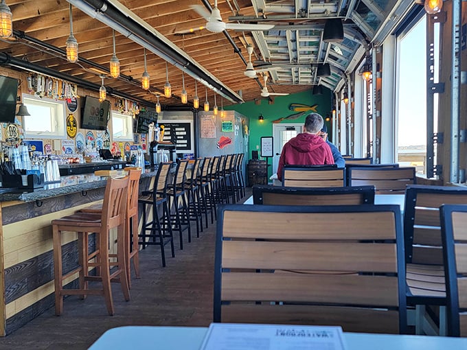 The bar area feels like the coolest friend's beach house – if that friend happened to have exceptional taste in seafood.