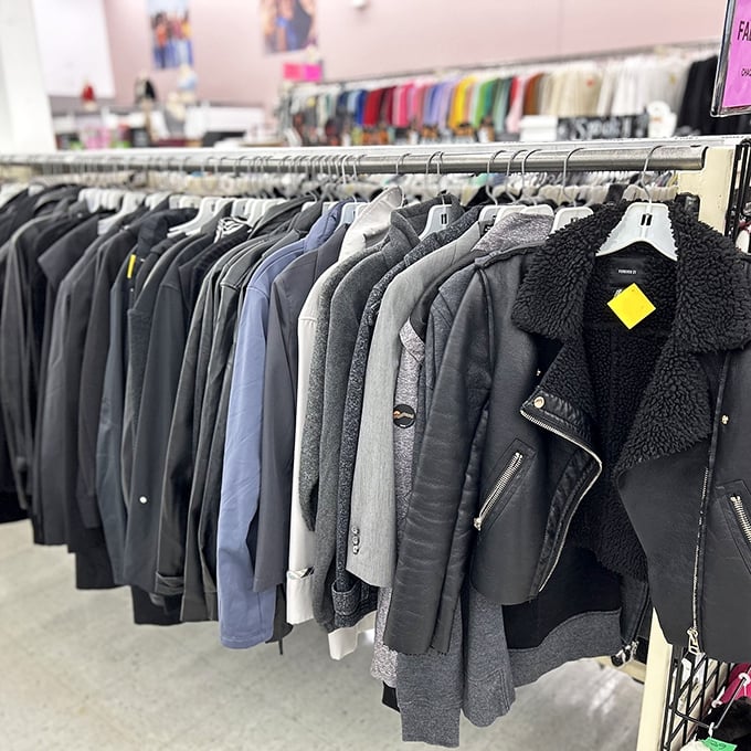 The jacket section – where leather, denim, and wool tell stories of previous lives while waiting for their next chapter.
