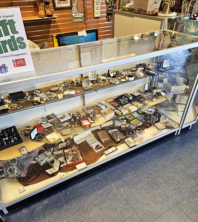 The jewelry counter sparkles with possibilities. Someone's forgotten bracelet could become your signature piece—at a fraction of retail price.
