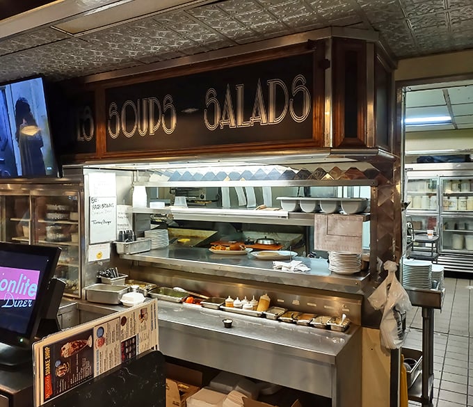 The "Soups-Salads" station isn't just a kitchen area—it's command central for comfort food operations that run with military precision.
