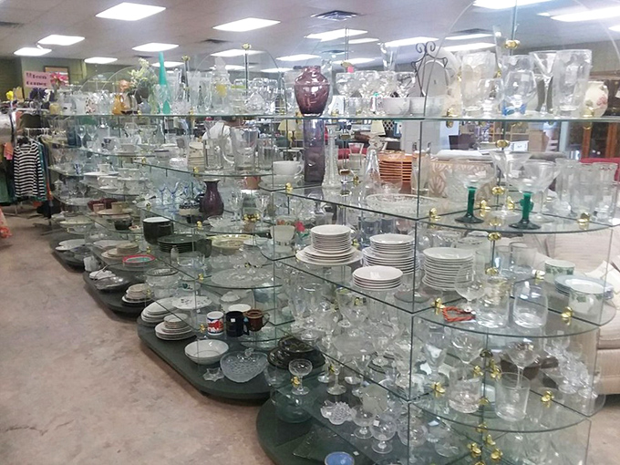 Glass shelves gleaming with possibilities – from everyday tumblers to crystal that would make your grandmother proud.