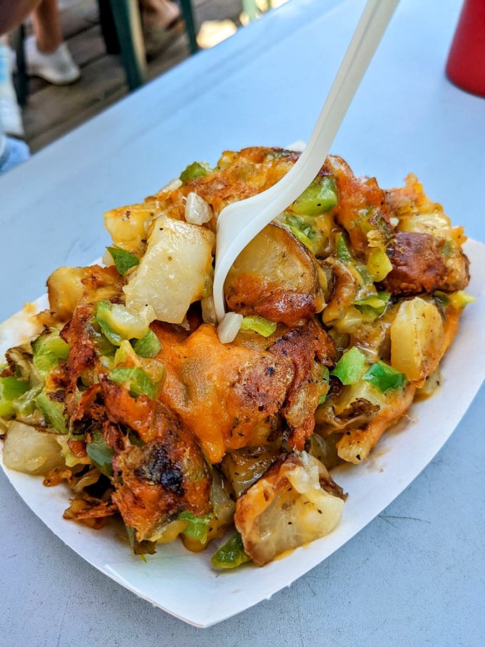 Kono's Potatoes aren't just a side dish, they're the main event—a glorious jumble of spuds, cheese, and peppers that might make you forget about the rest of your meal.
