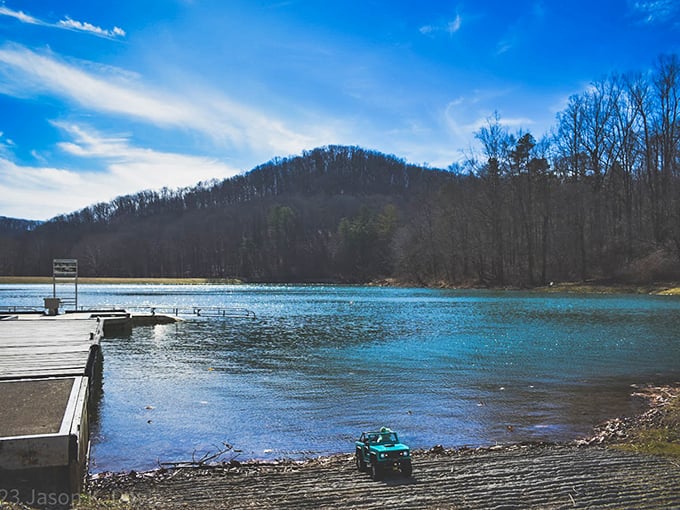 Morning's first light plays across Pine Lake. That impossibly blue sky promises a perfect day for casting lines where cell service can't find you.