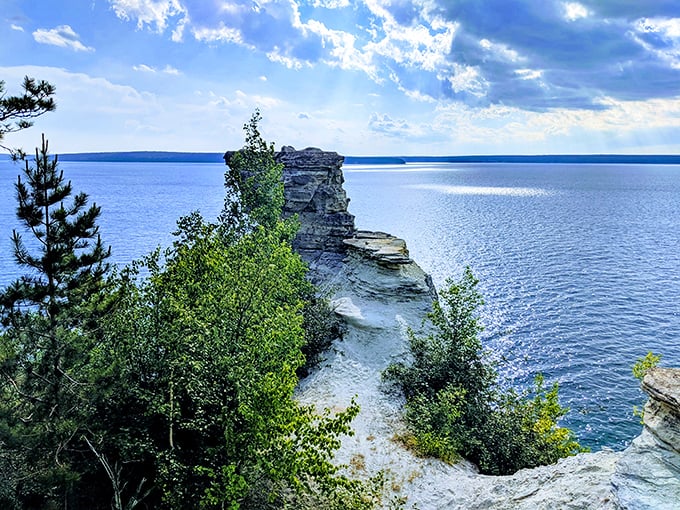 This rocky sentinel stands guard over Lake Superior's vastness, trees defiantly growing where no landscaper would dare plant them.