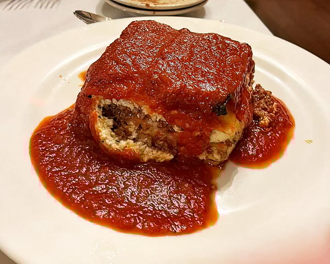 Lasagna that doesn't know the meaning of restraint—layers of pasta, cheese, and meat sauce in a relationship so perfect it should write a self-help book.