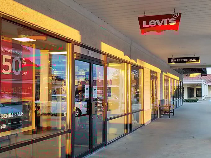 Levi's storefront beckons with the promise of denim that flatters everyone – the true American dream wrapped in a 50% off sale.