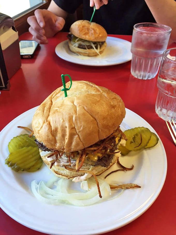 This burger doesn't need a fancy name—just fresh beef, melted cheese, and a soft bun that squishes down to mouth-size when you pick it up.