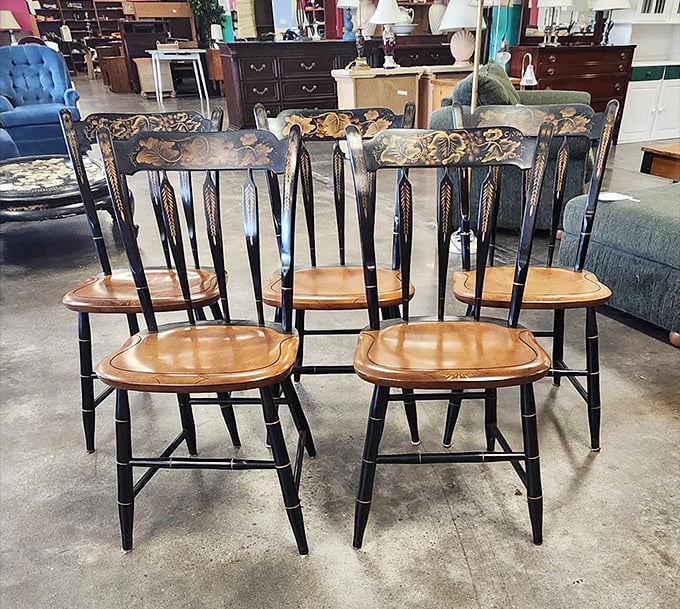 These Hitchcock-style chairs with their distinctive stenciling aren't just seating—they're conversation pieces with better posture than most dinner guests.