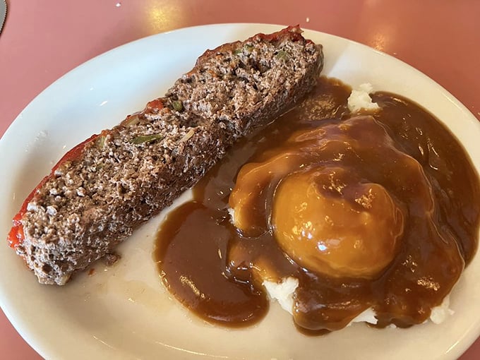The meatloaf and mashed potatoes swimming in rich brown gravy—proof that sometimes the most delicious things aren't the most photogenic.