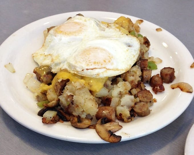 The Michigan Hash doesn't just feed you – it fortifies you with a mountain of potatoes, mushrooms, and eggs for whatever the day brings.